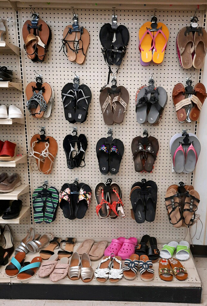 Flip-flop fantasy land! Every summer footwear option imaginable, arranged with the precision of a small shoe boutique.