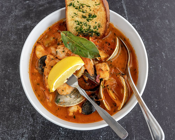 This seafood stew is a maritime United Nations&mdash;shellfish and fish swimming in harmony through a tomato-based broth. Crusty bread required.