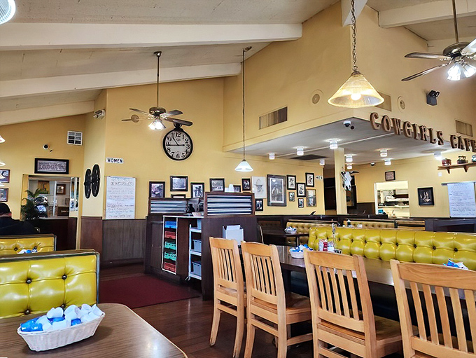 The dining room's warm yellow walls and wooden accents create an atmosphere that says "stay awhile" without saying a word.