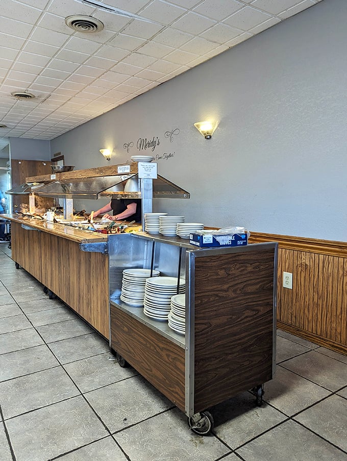 The self-service counter: where patience is rewarded with plates piled high and the staff works magic behind steaming trays.