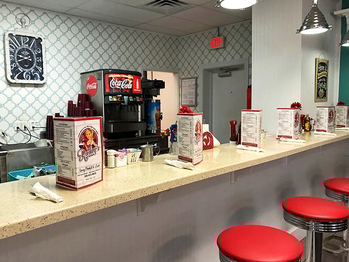 The counter view: where menus stand ready and the soda fountain harkens back to simpler times when breakfast was the day's main event.