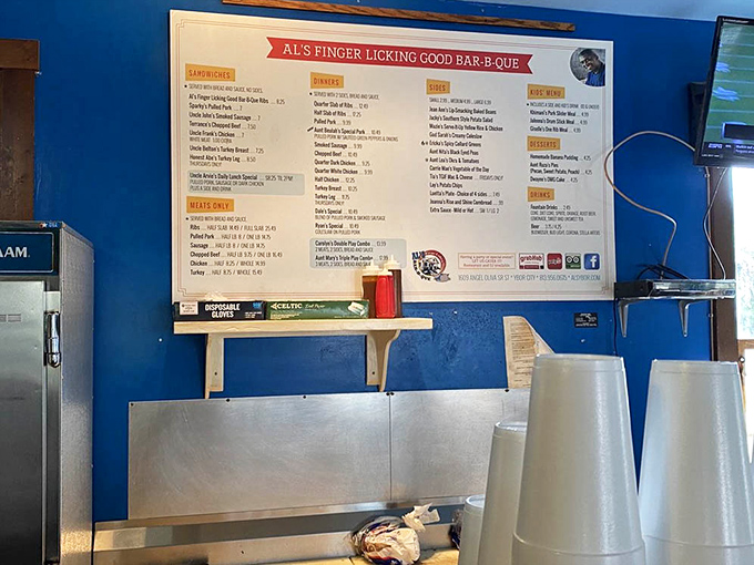 The menu board isn't just informative&mdash;it's a hall of fame where barbecue legends are immortalized in white lettering and reasonable prices.
