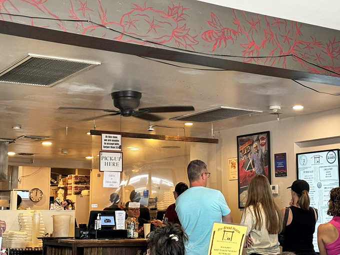 The ordering area hums with anticipation as hungry patrons wait for their fry bread fix. Some things are worth the wait.