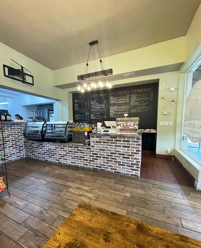 Another angle of sandwich headquarters &ndash; where orders are placed and dreams come true under the warm glow of Edison bulbs.