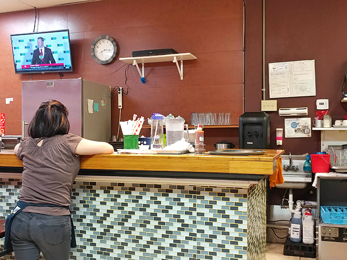 A peek inside reveals the restaurant's casual, welcoming vibe. Those ceiling fans keep things comfortable while you focus on the important business of eating.