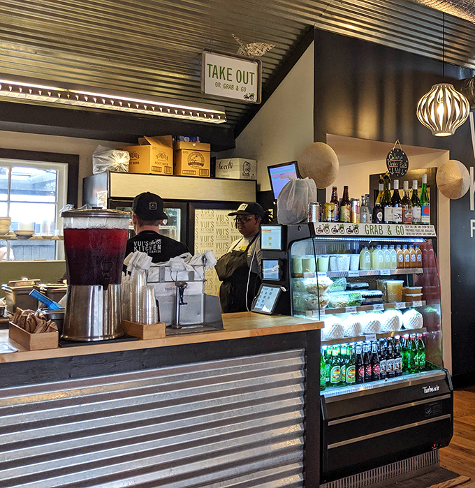 Behind every great meal is a dedicated team, working their magic in a space where efficiency meets the art of Vietnamese cooking.