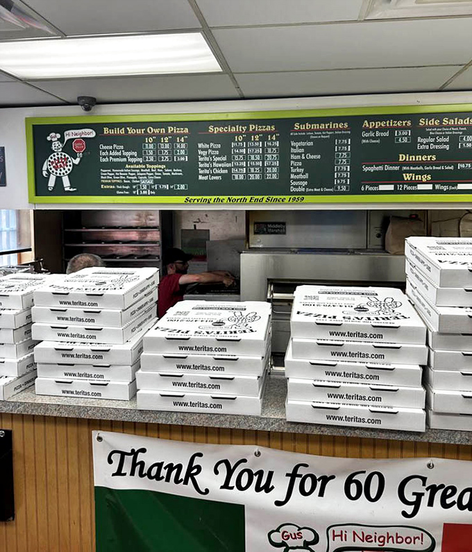 The service counter on a busy night&mdash;a testament to six decades of pizza perfection that keeps Columbus coming back for "just one more slice."