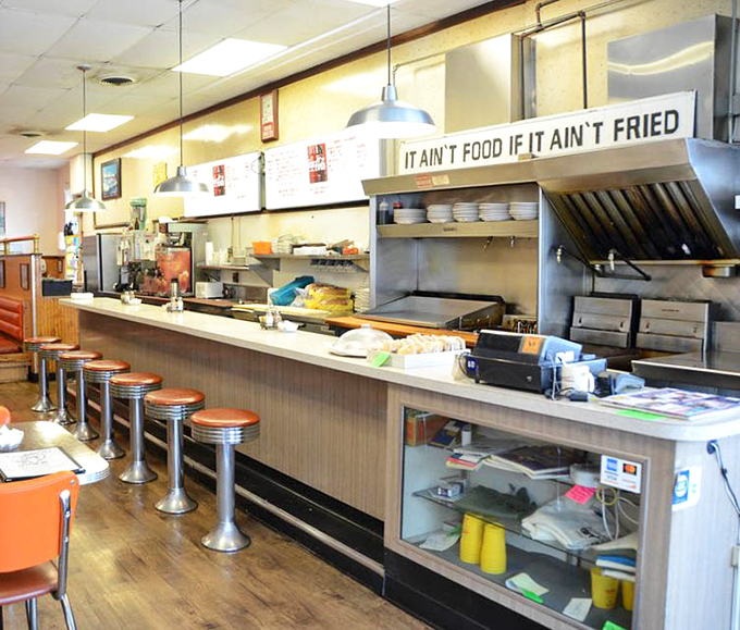 Where breakfast dreams come true. Those chrome stools have supported more morning philosophizing than most university lecture halls.