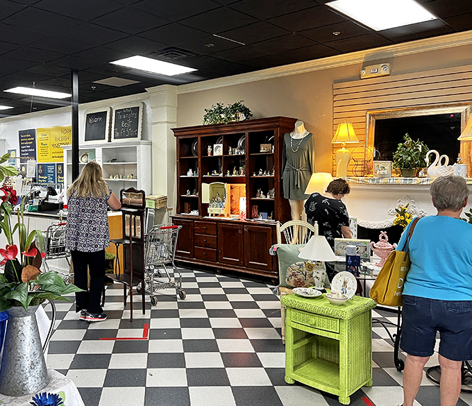 The checkerboard floor adds a touch of retro charm as shoppers explore curated vignettes of home goods. Every corner offers new possibilities.