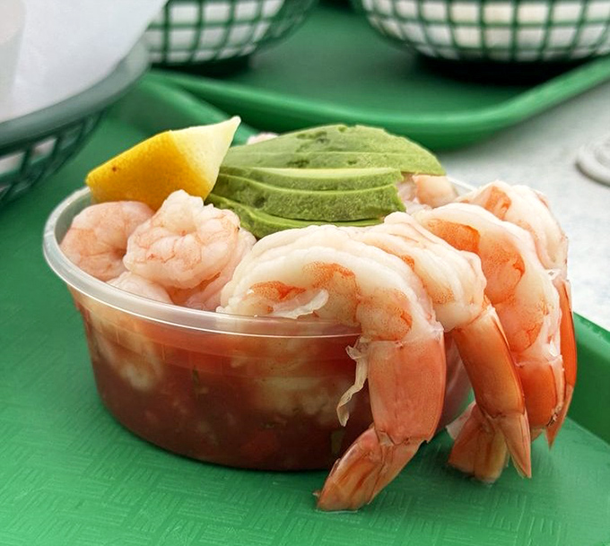 Plump shrimp cocktail with avocado &ndash; sea-sweet protein arranged like a bouquet around creamy green gold. Nature's perfect appetizer in plastic perfection.