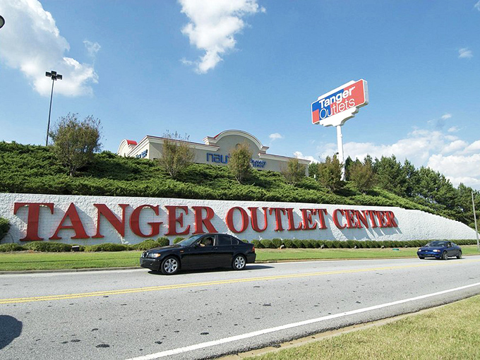 The entrance sign that launches a thousand shopping sprees. Like retail's version of "Once upon a time," it promises adventures in bargain hunting.