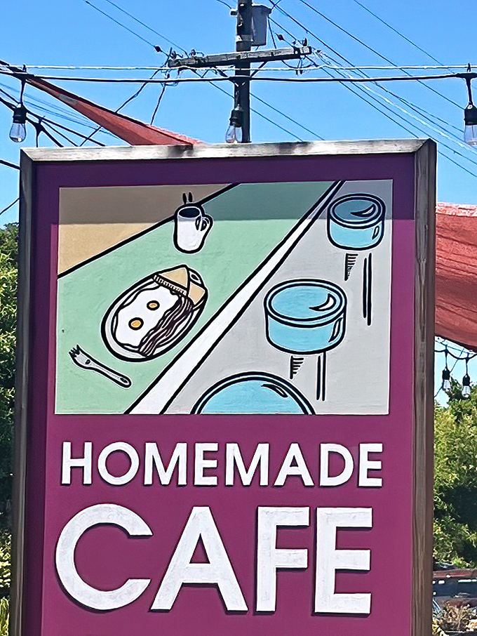 A sign that promises exactly what you'll find inside: no gimmicks, just straightforward diner art that's been guiding hungry folks for decades.