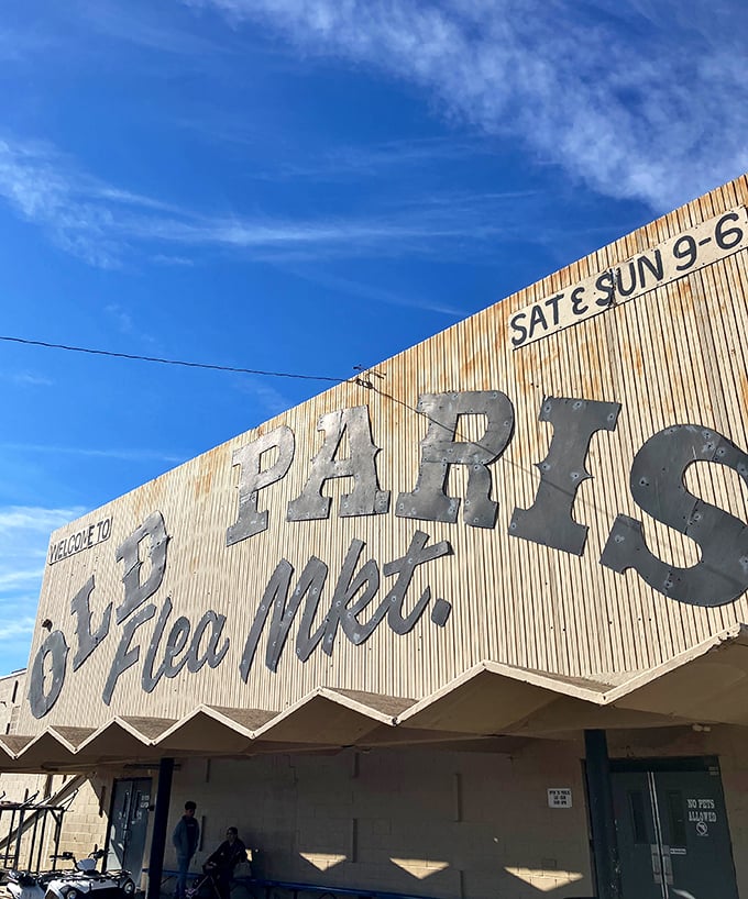 The weathered sign against that perfect Oklahoma blue sky isn't just advertising weekend hours&mdash;it's promising adventure to anyone smart enough to show up.