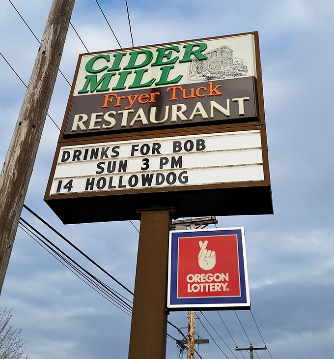 The roadside sign announces community events alongside the restaurant name &ndash; this isn't just a place to eat, it's a neighborhood hub.