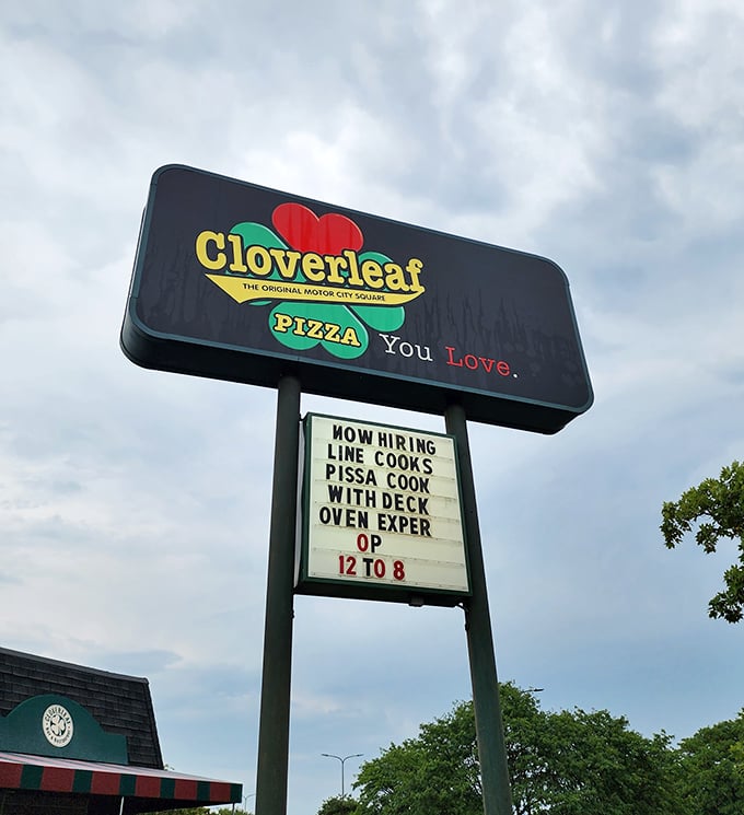 "The Original Motor City Square"&mdash;a slogan that carries the weight of Detroit pizza history on its neon shoulders.