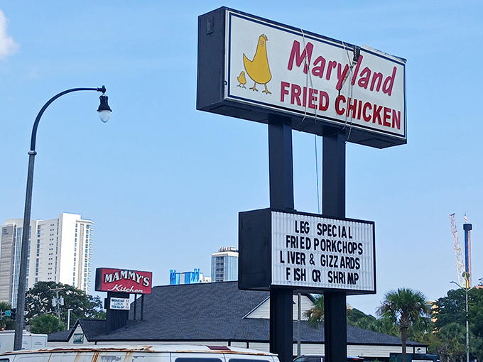 The roadside sign stands tall among Myrtle Beach high-rises, a beacon for those seeking authentic local flavor amid tourist attractions.