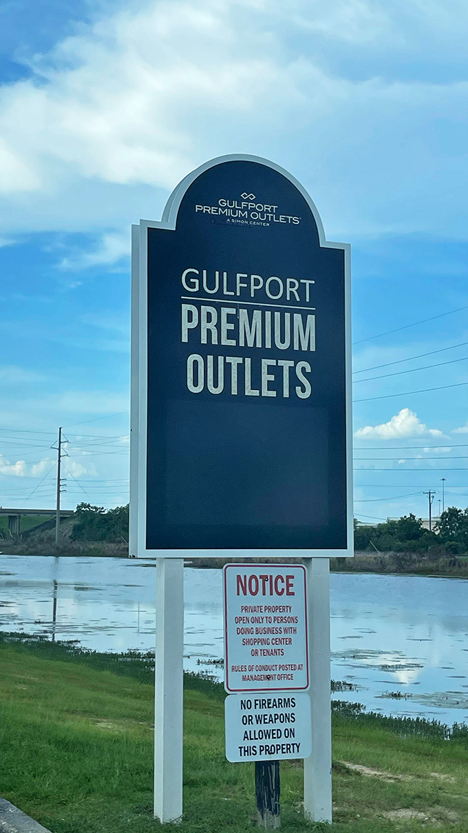 The gateway to bargain heaven. This sign doesn't just mark an entrance&mdash;it's practically a beacon for savvy shoppers seeking retail therapy on the Gulf Coast.