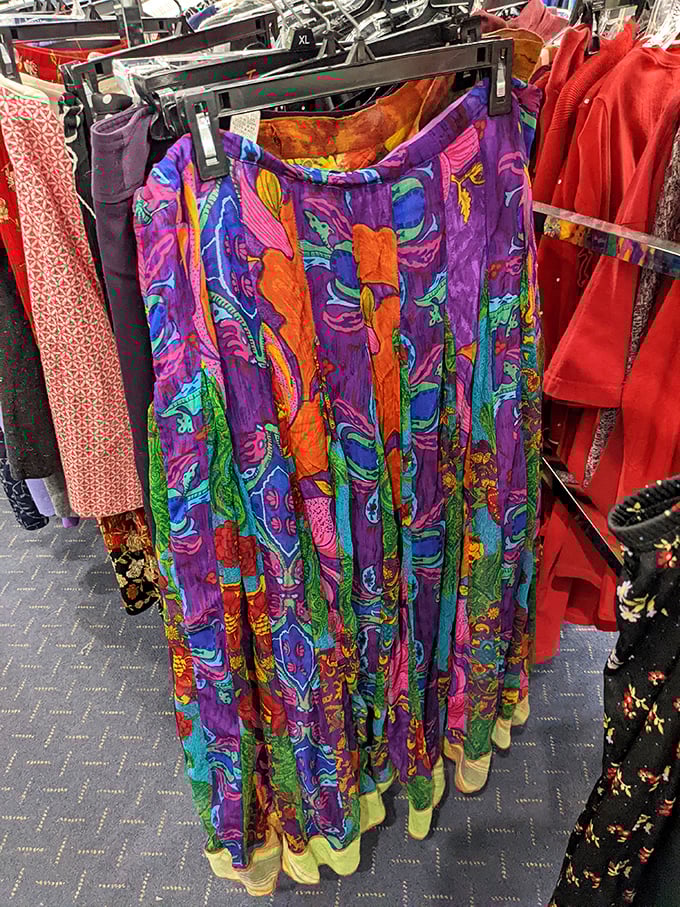 A skirt bursting with colors that would make Frida Kahlo nod in approval. Wearable art hanging casually between everyday basics.