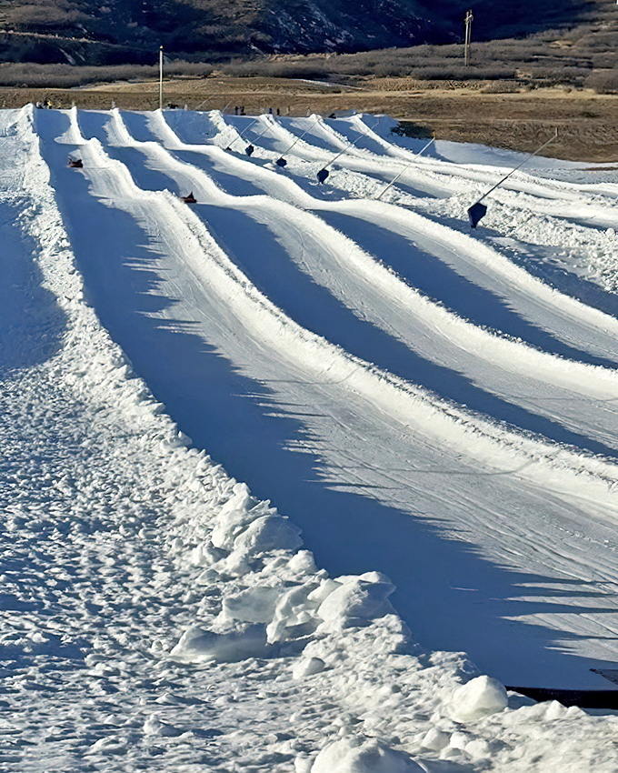 Winter's playground perfected: these snow tubing lanes deliver childlike joy to visitors of all ages &ndash; no special skills required, just willingness to laugh.