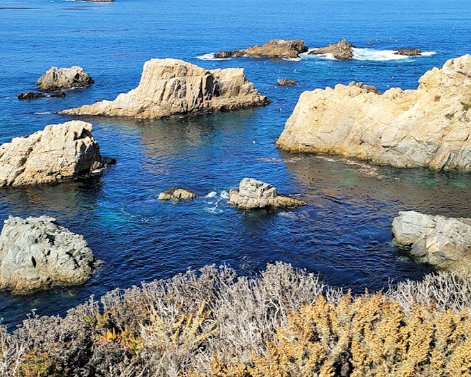 Ocean-carved rock formations that look like they're posing for their album cover. The turquoise waters provide a backdrop worthy of any travel magazine.