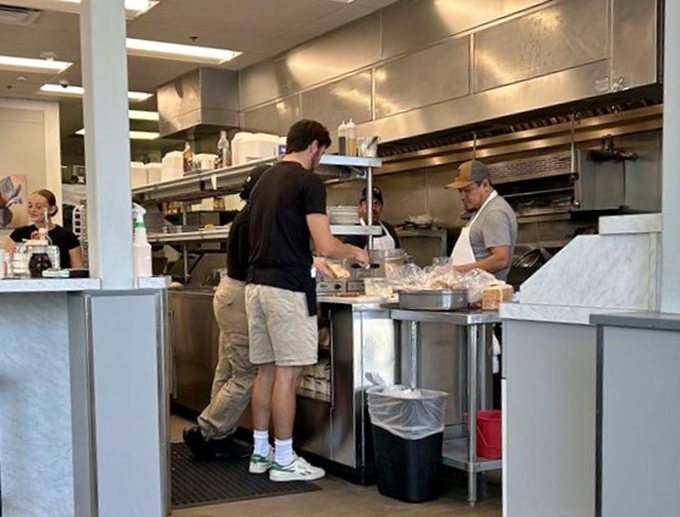 The kitchen crew works with the precision of a synchronized swim team&mdash;except they're creating omelets instead of water formations.