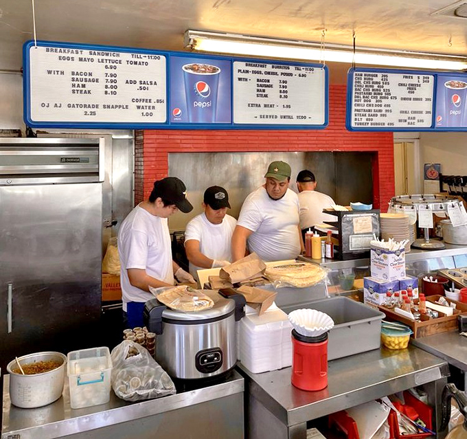 The breakfast burrito assembly line&mdash;where speed meets precision. These culinary craftsmen have the workflow of a Formula One pit crew.