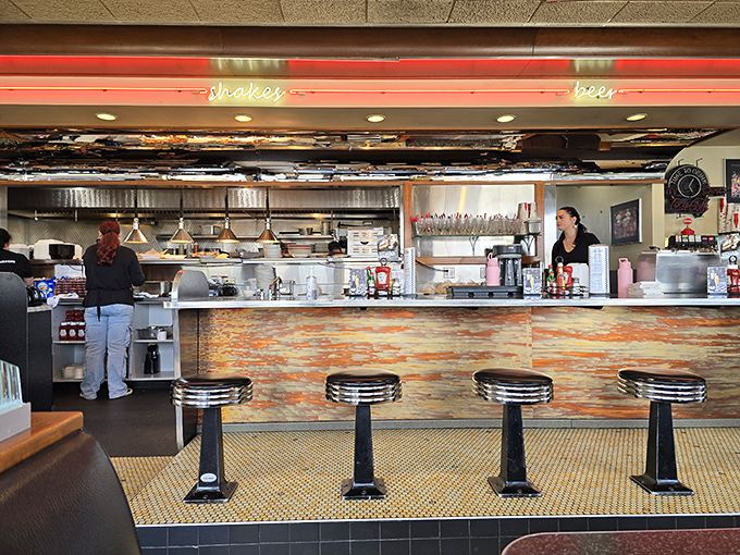 Behind the counter, where the magic happens. These aren't just cooks and servers&mdash;they're happiness engineers with spatulas and coffee pots.