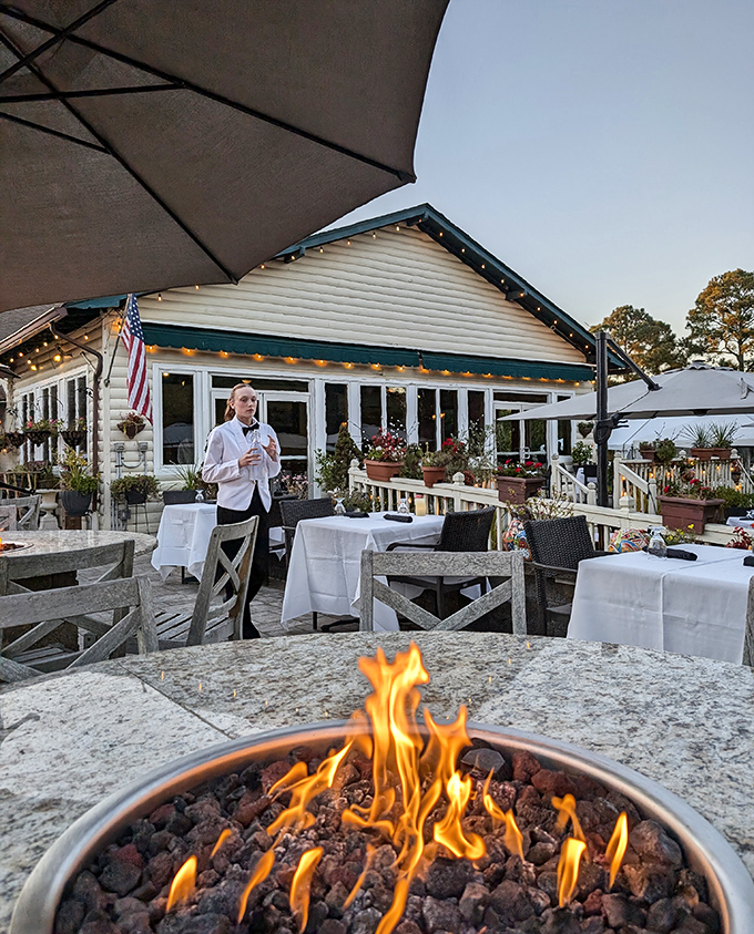 As twilight falls, the patio transforms with firelight and attentive service—dinner and a show courtesy of Mother Nature's sunset palette.