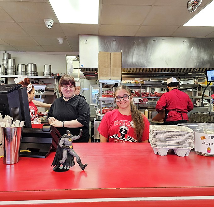 Behind every great diner is a team that keeps the magic flowing&mdash;complete with Batman standing guard over the milkshake station.