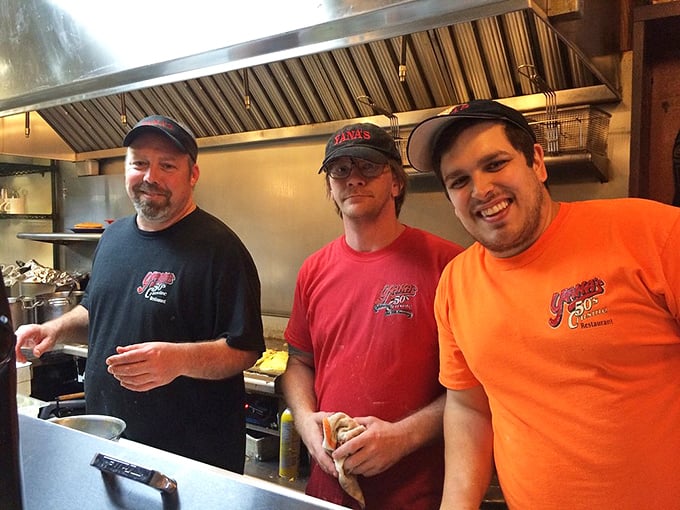 These guys behind the grill look like they could write a dissertation on the perfect hash brown technique.