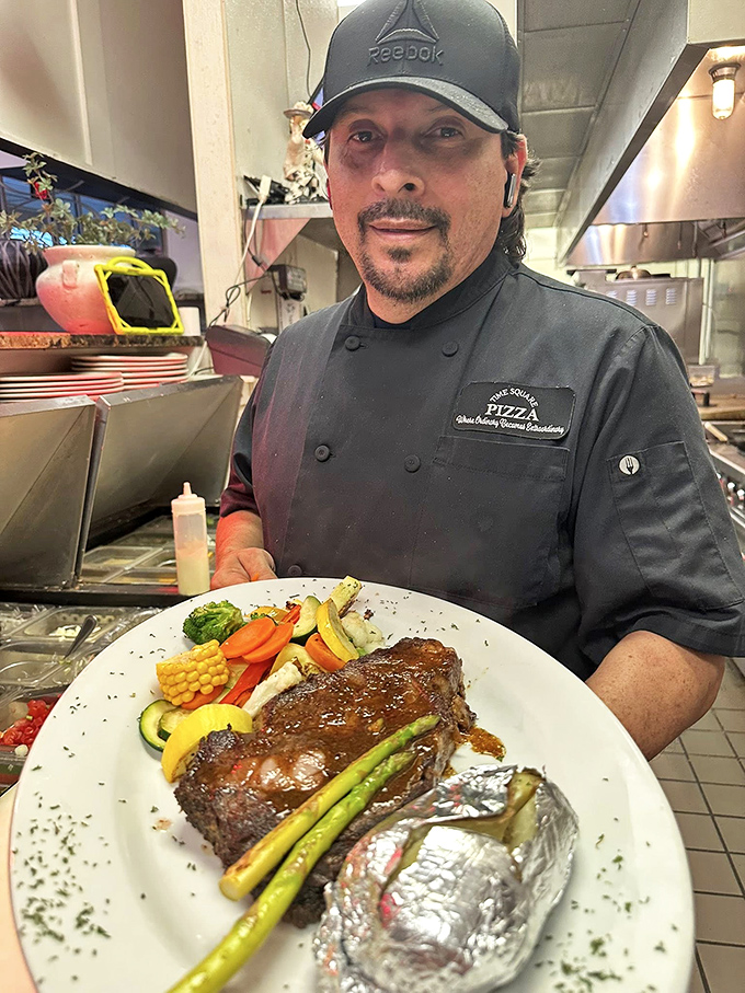 Culinary craftsmanship on display. When your steak comes with this much care and colorful vegetables, you know you're in good hands.