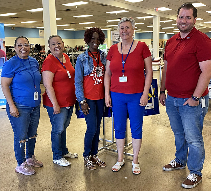 The friendly faces behind the bargains &ndash; Goodwill staff who transform donations into organized departments of possibility.