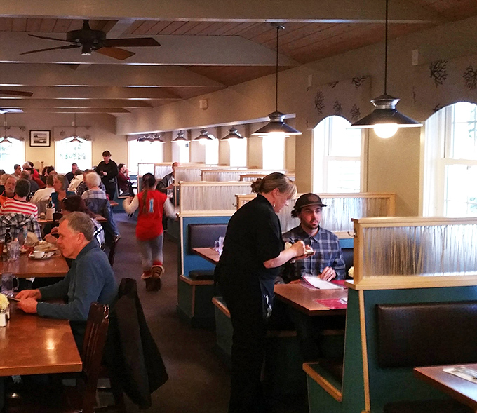 Taking orders with the efficiency of a Swiss watch and the warmth of your favorite aunt at Thanksgiving.