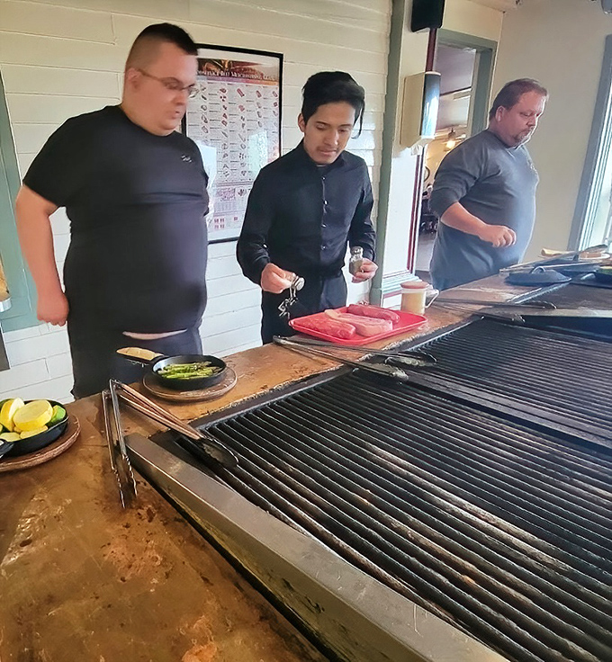 The team at work, creating the kind of meals that turn first-timers into lifetime devotees.