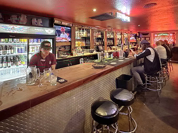 Behind the bar, bottles gleam like a liquid library of good decisions. The metal stools have witnessed countless "I'll just have one more" promises.