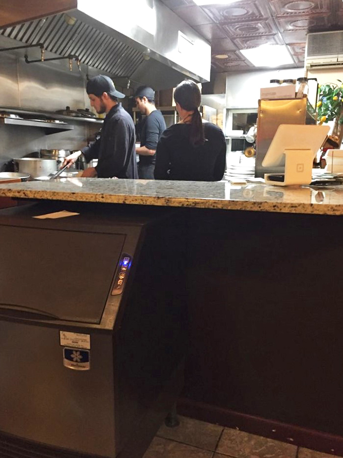 Behind the scenes, the kitchen staff orchestrates your meal with the focused precision of NASA engineers—except their mission is your perfect dinner.