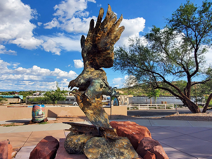 This magnificent bronze eagle sculpture greets visitors, symbolizing the majestic raptors that soar through the canyon alongside the train.