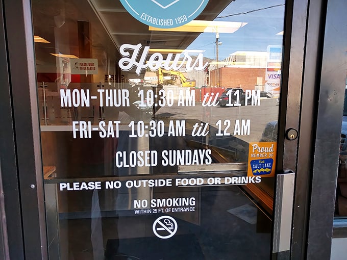 The hours posted on the door are practically a public service announcement: "Plan accordingly if you need your burger fix!"