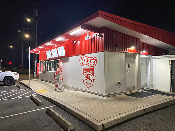 Even at night, Mike's red and white glow serves as a lighthouse for the hungry, a beacon of hope in a sea of chain restaurants.