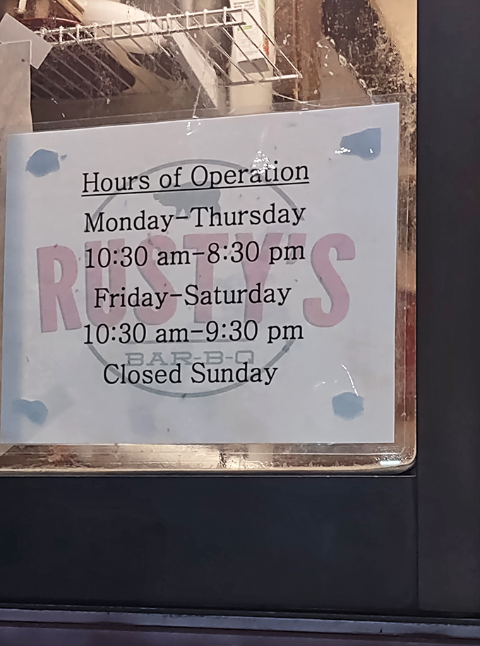 The hours sign tells you exactly when you can get your barbecue fix &ndash; plan accordingly or face the consequences of missing out.