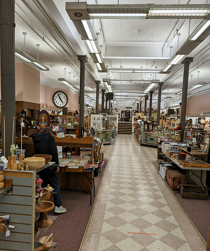 The wide, welcoming aisles invite exploration without the claustrophobia that plagues lesser antique stores. Your elbows will thank you.
