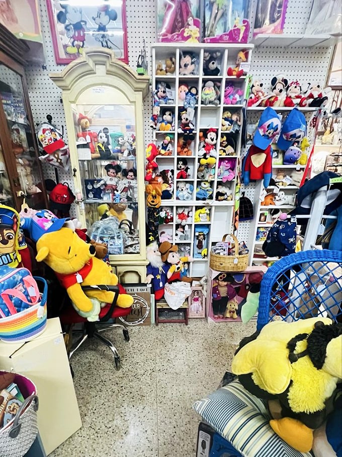 A stuffed animal kingdom where childhood memories are preserved in plush. Mickey and friends holding court in their vintage glory.