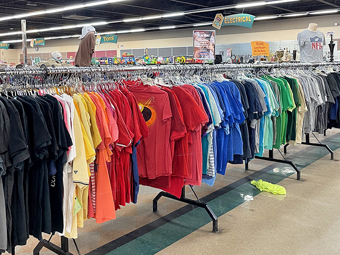 The rainbow road of t-shirts &ndash; organized by color with the precision of someone who clearly understands the importance of visual satisfaction.