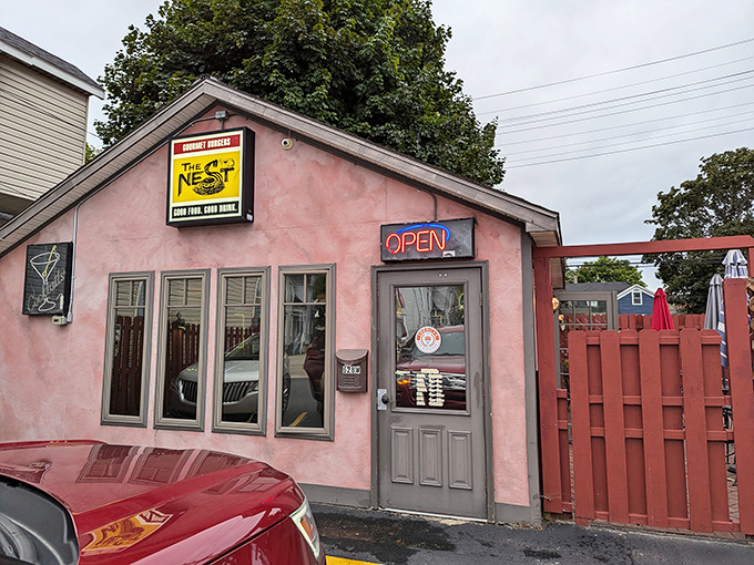 The Nest's pink exterior and red fence make this unassuming eatery impossible to miss&mdash;and trust me, you wouldn't want to miss what's cooking inside.