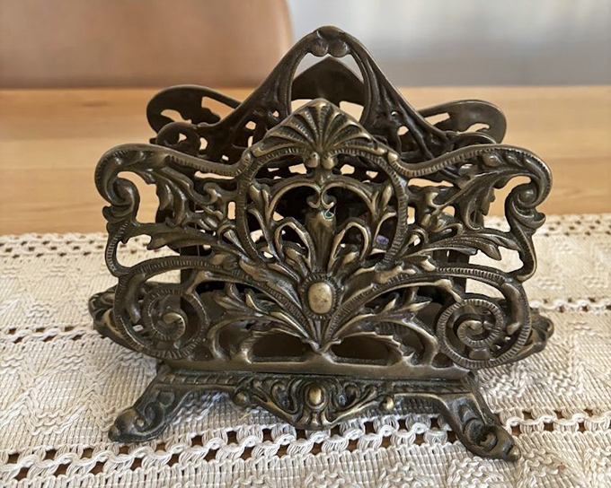 Not just a tissue holder&mdash;a miniature metal masterpiece of Victorian excess. Even your sneezes deserved ornate presentation back then!