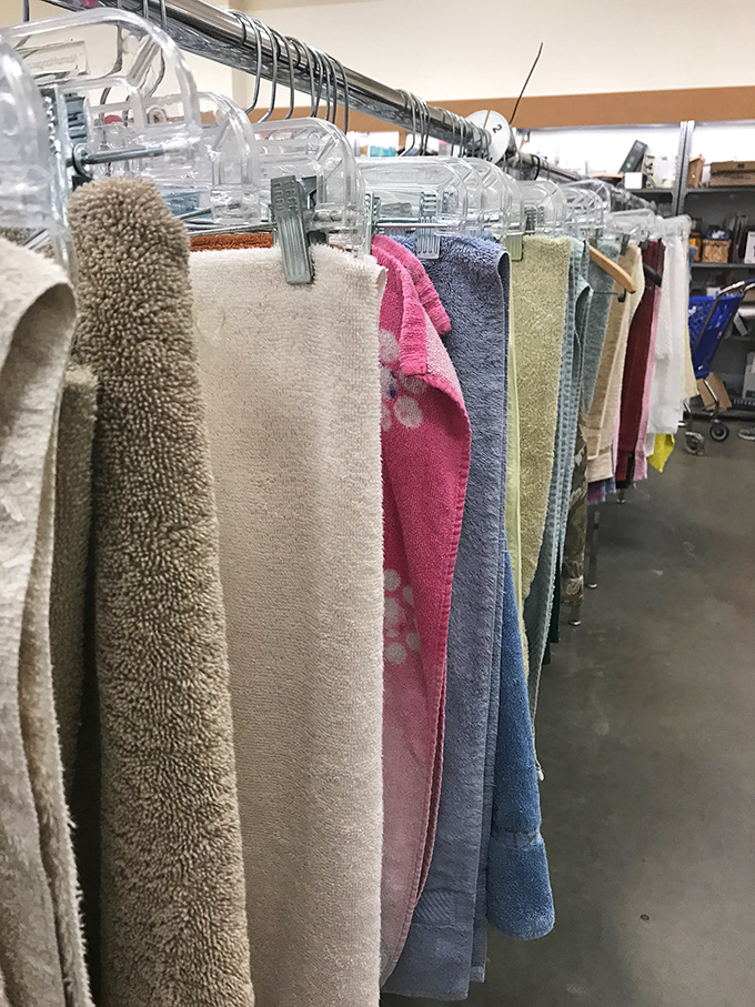 The towel section: a rainbow of terry cloth possibilities where someone else's linen closet cleanout becomes your bathroom refresh for pocket change.