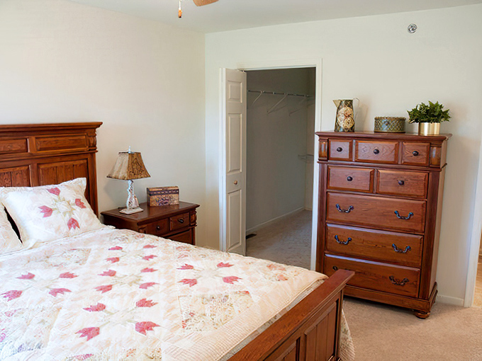 Bedrooms that balance comfort with style. Traditional furnishings create a restful retreat that's miles away from institutional retirement living.