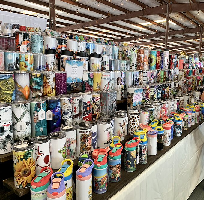 Tumbler heaven! A rainbow collection of insulated cups promising to keep your drinks cold during the Texas heat. Hydration with personality.