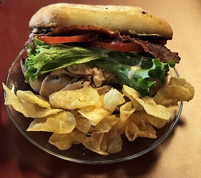 Even the savory options demand attention&mdash;this turkey club sandwich with chips proves they're not just a one-trick pony.