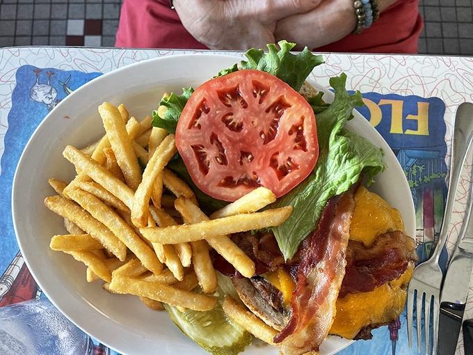 A burger that belongs on the cover of "Burger Monthly" &ndash; if such a magazine existed, this photogenic stack of beef, bacon and cheese would have a subscription.
